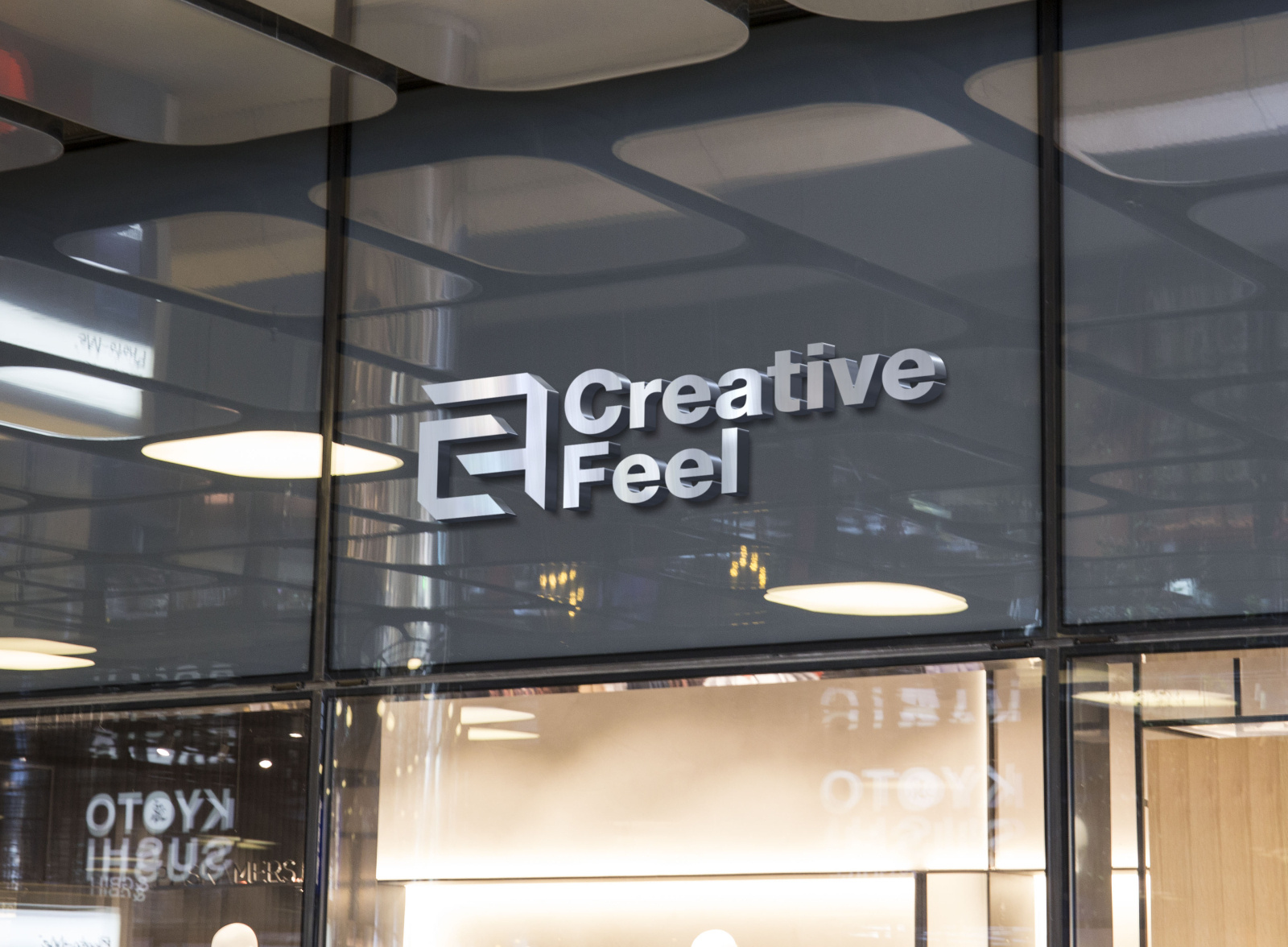 Creative Feel logo mock up by Collins Tugume on Dribbble