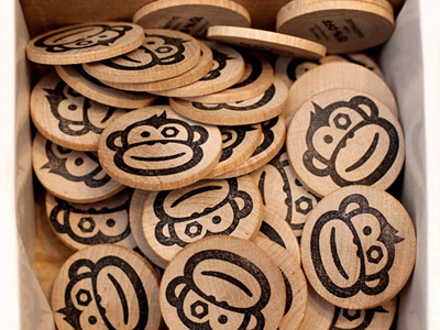 Hand stamped wooden tokens by Paula Chang on Dribbble